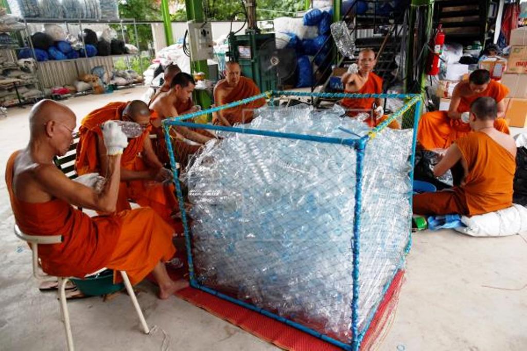 Buddhist Monks In Thailand Wear Robes Made From Recycled Plastic